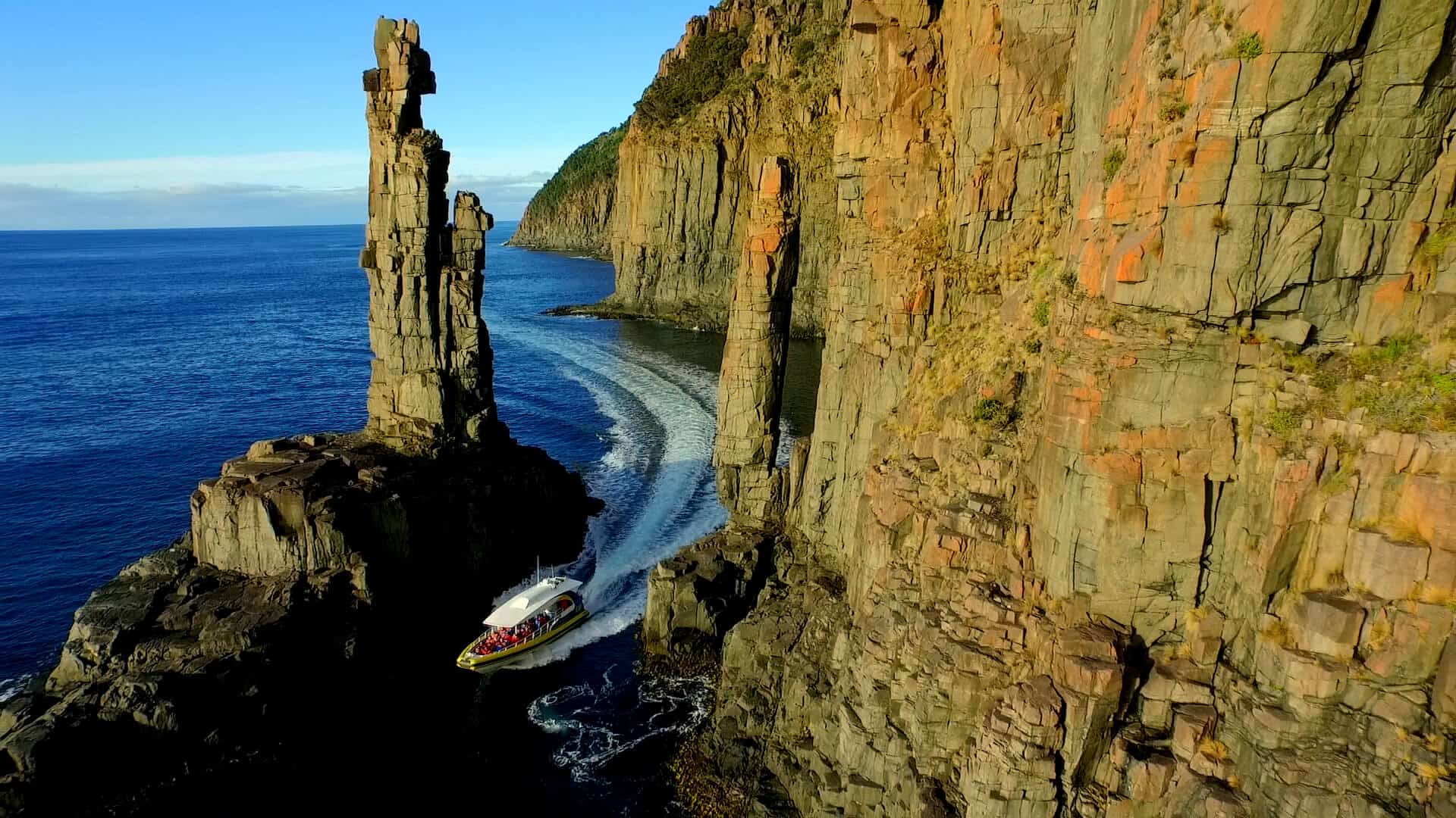 Explore Tasmania Tour Offerings: Self-Drive, Bus, & Guided Walk Tours